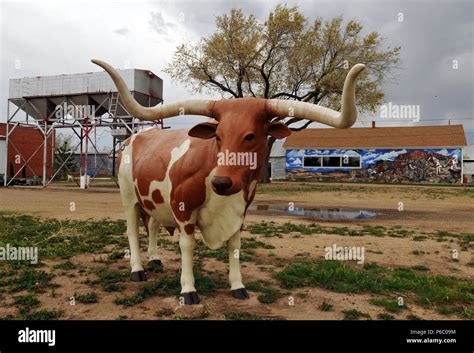 A Longhorn Cattle Statue Stands In The Route 66 Town Of Vega Texas