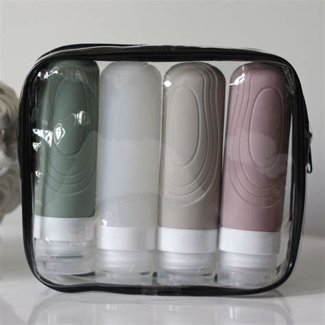 Дорожный набор флаконов силиконовые для путешествий баночки для косметики 4 шт 90 мл в