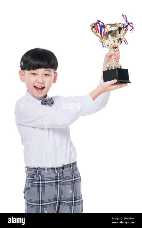 Happy Pupils Holding The Cup Stock Photo Alamy