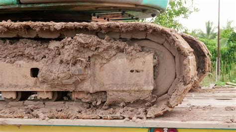 Descarga Gratis Vídeos De Stock De Detalle De Oruga Retroexcavadora En