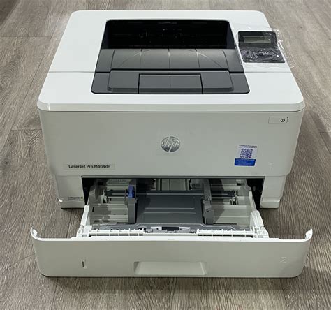 Bơm mực máy in HP M404dn tận nơi