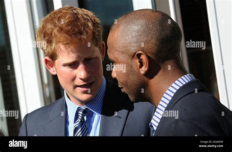 England 2018 Bid Team Ambassador Lucas Radebe And Prince Harry Left Attend An Fa Reception At