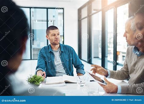 Analysing The Project Together A Group Of Colleagues Having A Meeting