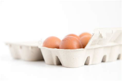 Detail Of An Open Recycled Cardboard Egg Carton With Eggs Inside On A