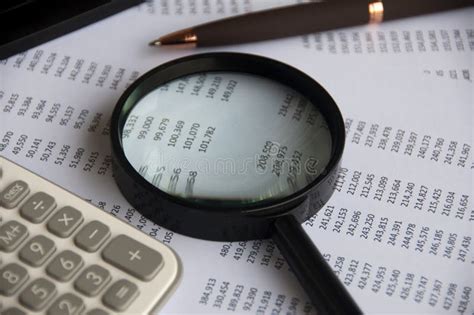Business Analysis Concept Magnifying Glass With Pen Calculator And