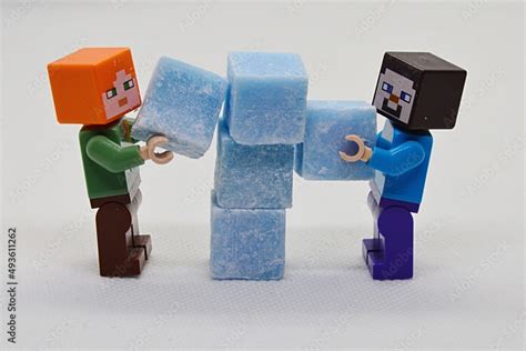 Lego Minecraft Figures Of Steve And Alex Are Building Ice Looking