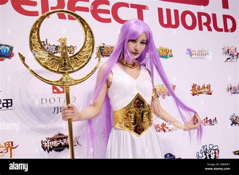 File A Showgirl Dressed In Costume Of Athena Poses At The Stand Of