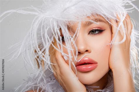 Gorgeous Blonde Bride In Luxury White Lingerie With White Feathers