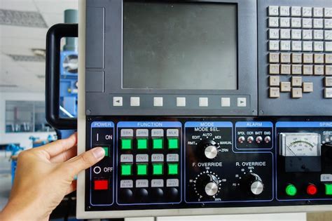 Premium Photo Close Up Of Hand Using Control Panel
