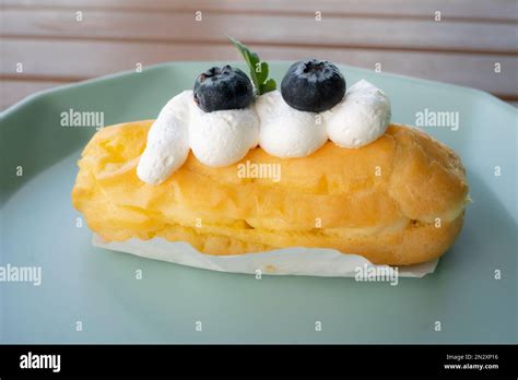 Deliciously Crisp Puffy Eclairs Filled With Vanilla Pastry Cream And