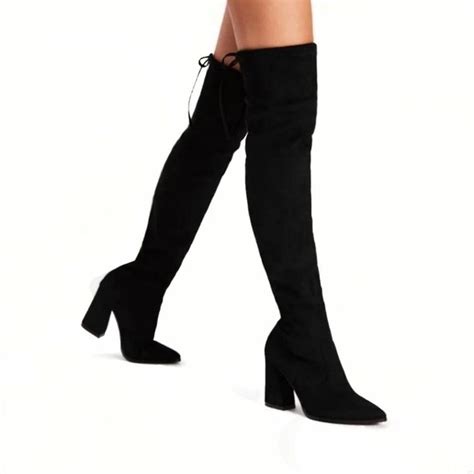 10 Outfits Con Botas Negras Largas Que Puedes Combinar Con Vestido