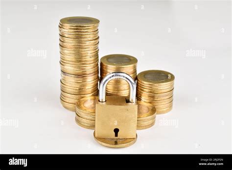 Padlock With Coin Stack Isolated On White Background Money Security