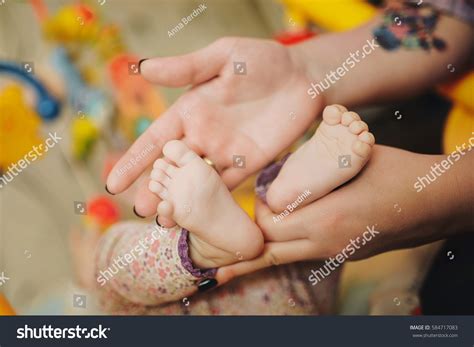Mother Holding Her Baby Girls Feet Stock Photo Shutterstock