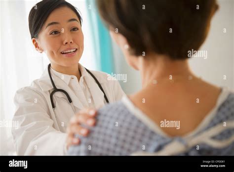 Japanese Doctor Talking To Patient Stock Photo Alamy
