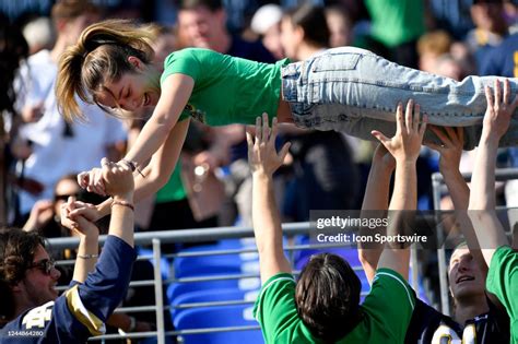 Notre Dame Fans Throw A Girl In The Air And Catch Her After A News