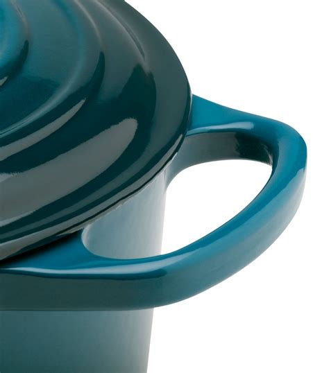 Le Creuset Turquoise Cast Iron Round Casserole Dish 24cm Harrods Uk