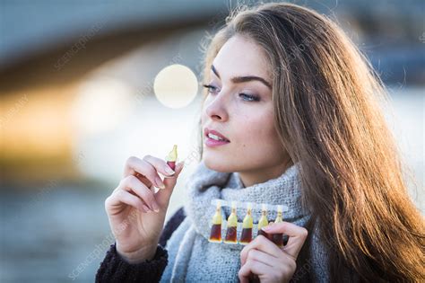 Woman Taking Propolis Oral Suspension Stock Image C0348605