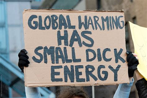 A Protest Sign Reading Global Warming Has Small Dick Energy By