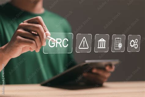 Grc Governance Risk And Compliance Concept Person Using Tablet With