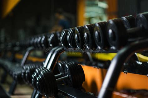 A Full Set Of Dumbbells Stuff For Effective Magnification Of Power And