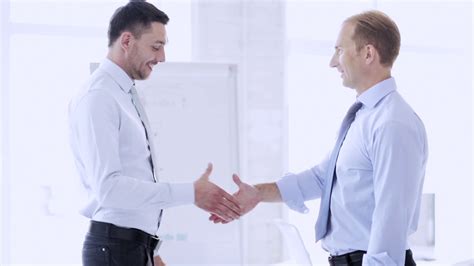 Business Handshake Two Businessmen Shaking Stock Footage SBV
