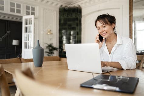 premium photo a female freelancer works in an office online doing a
